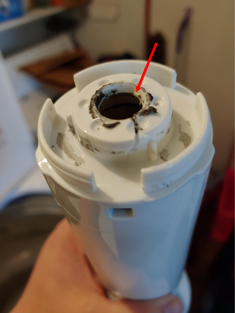 Black Flakes in Washing Machine: Causes & Fixes - SimplySwider.com