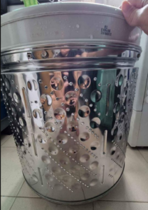 Black Flakes in Washing Machine: Causes & Fixes - SimplySwider.com