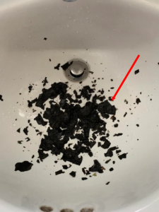 Black Flakes in Washing Machine: Causes & Fixes - SimplySwider.com