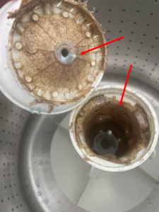 Black Flakes in Washing Machine: Causes & Fixes - SimplySwider.com