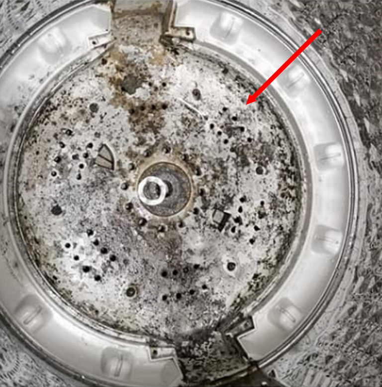 Black Flakes in Washing Machine: Causes & Fixes - SimplySwider.com
