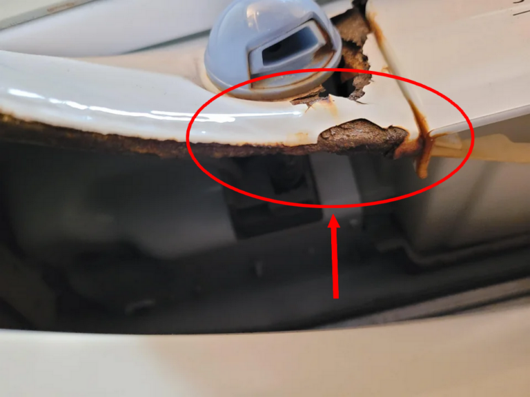 Black Flakes in Washing Machine: Causes & Fixes - SimplySwider.com