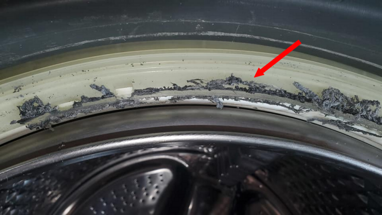 Black Flakes in Washing Machine: Causes & Fixes - SimplySwider.com